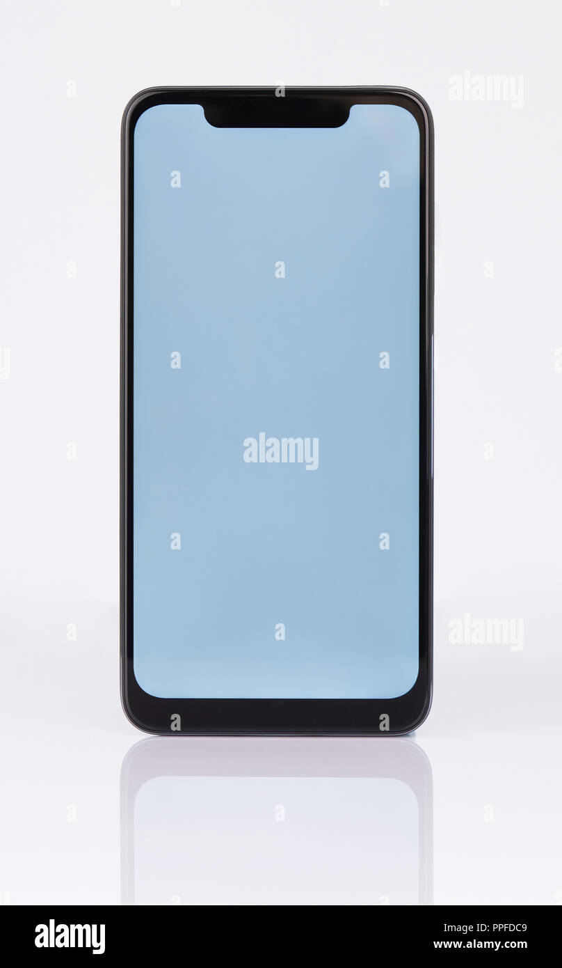 Front side of modern smartphone with notch isolated on white studio ...