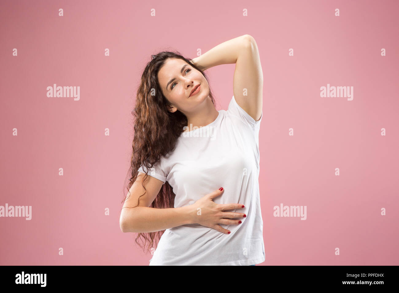 Happy business woman standing, smiling isolated on trendy pink studio ...