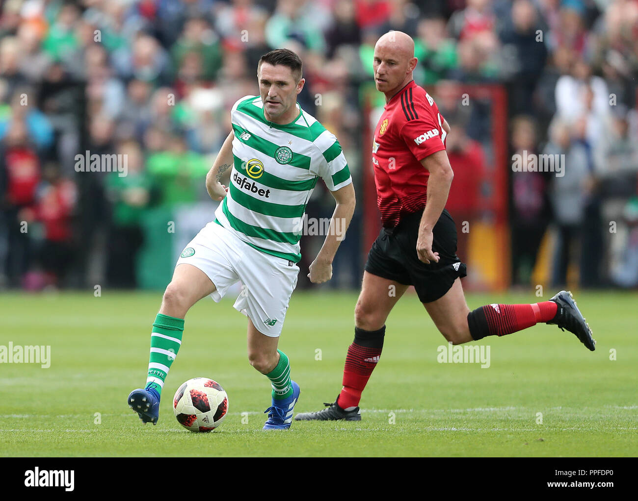 Celtic and Republic of Ireland Legends' Robbie Keane (left) and ...