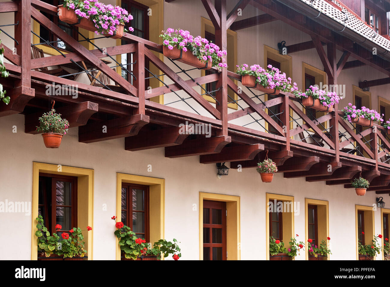 Detail of facade with courtyard balcony in the rain Stock Photo - Alamy