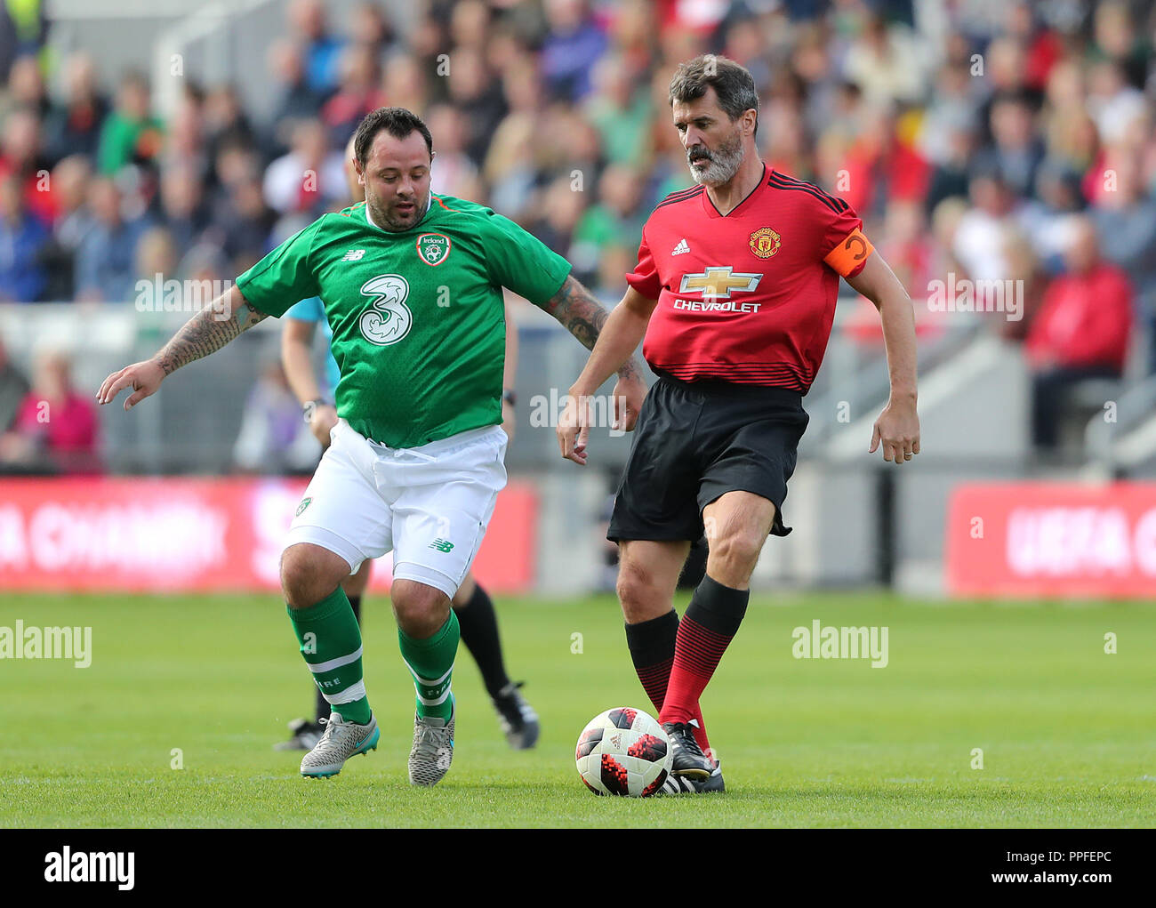 Celtic and Republic of Ireland Legends' Andy Reid (left) and Manchester ...