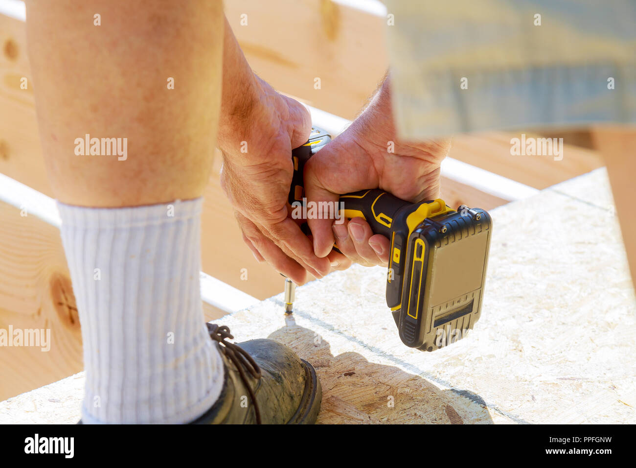 Handy man drilling hi-res stock photography and images - Alamy