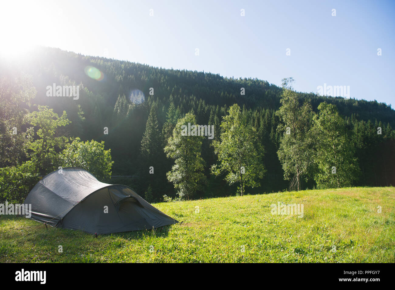 summer landscape with camp tent forest in Gudvangen, Neirofjord, Norway ...