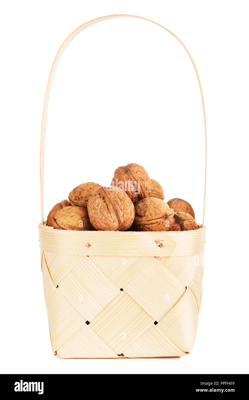 walnut in wooden basket, isolated on white background Stock Photo - Alamy