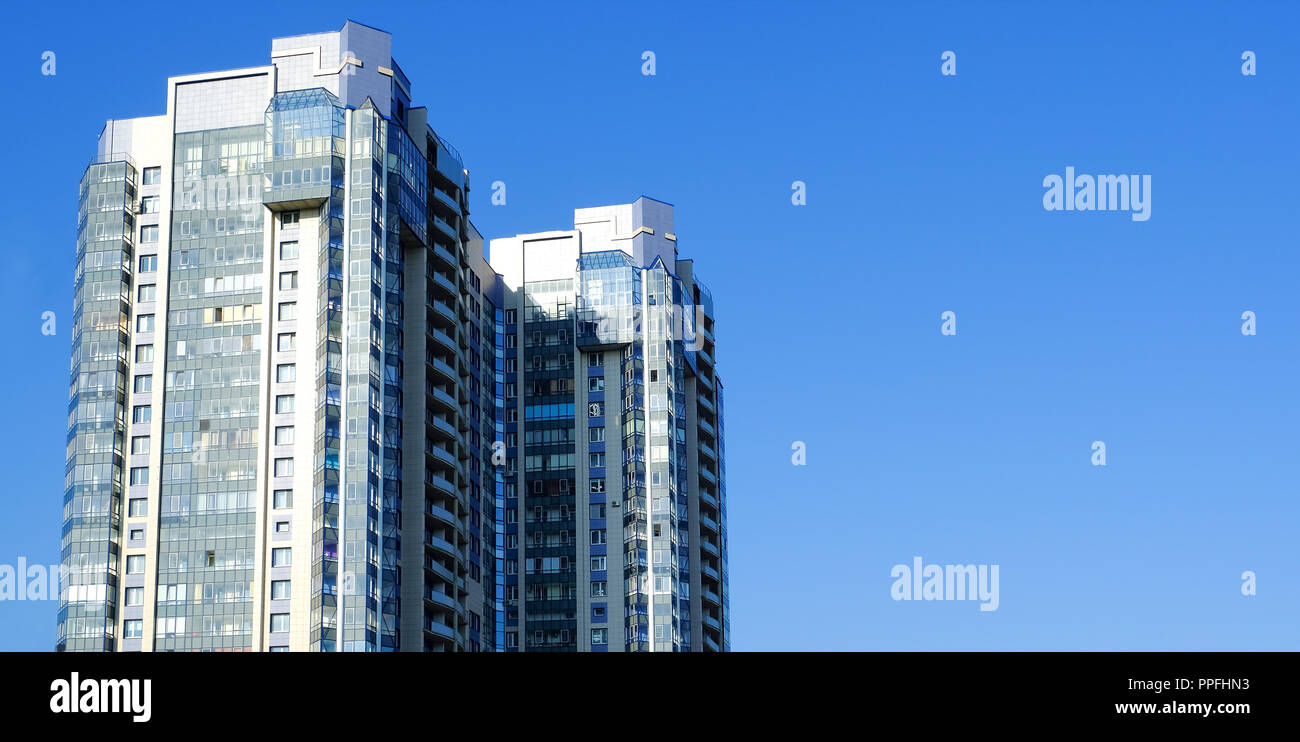 Modern residential building. Modern multi-storey building with glass ...