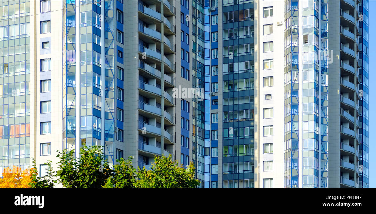 Modern residential building. Modern multi-storey building with glass ...