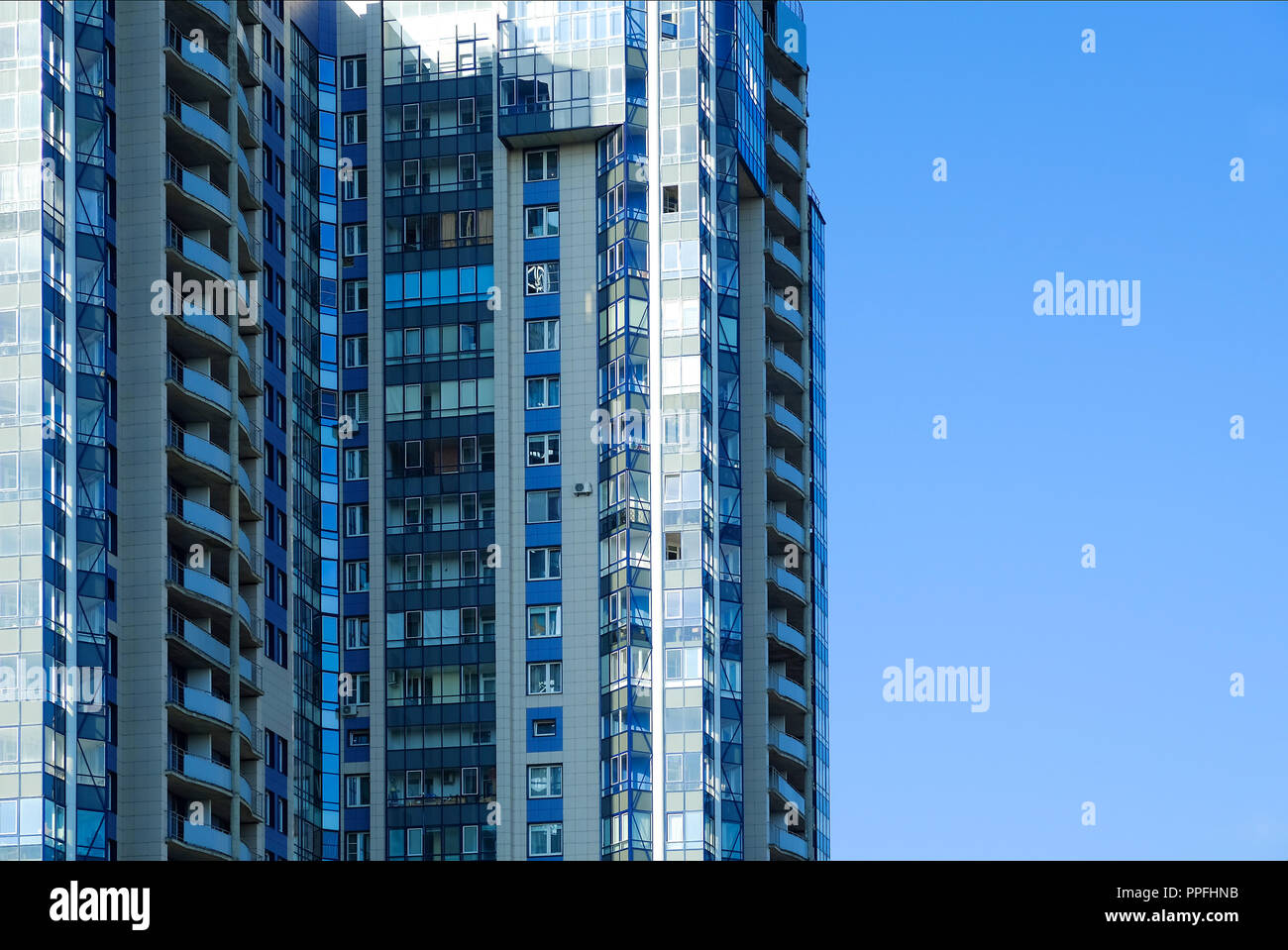 Modern residential building. Modern multi-storey building with glass ...