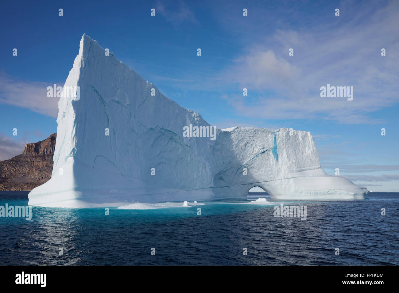 Big iceberg with gate in front of Uummannaq, Greenland Stock Photo - Alamy