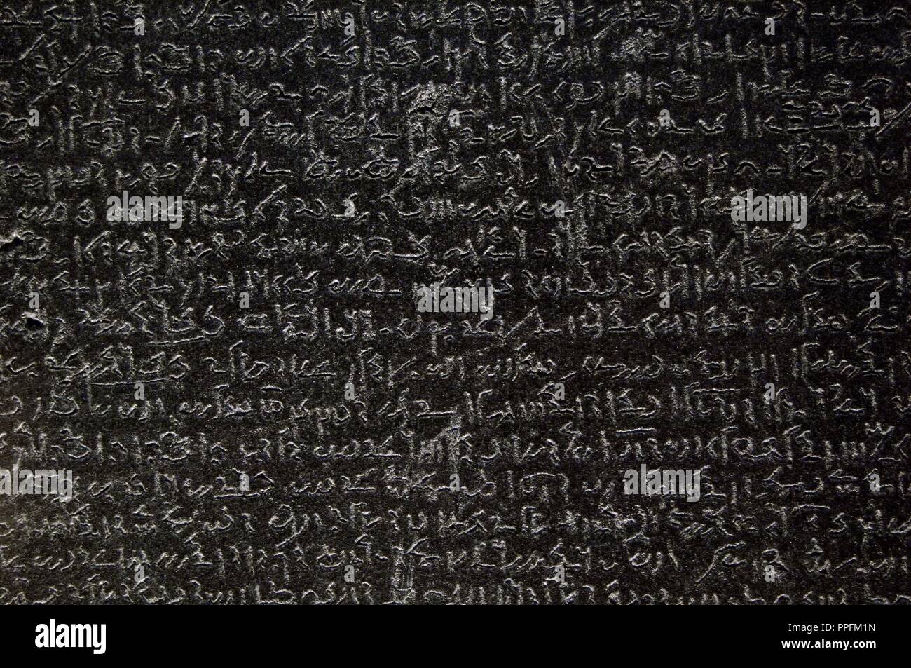 The Rosetta Stone. Fragment of a black granite stele with an ...