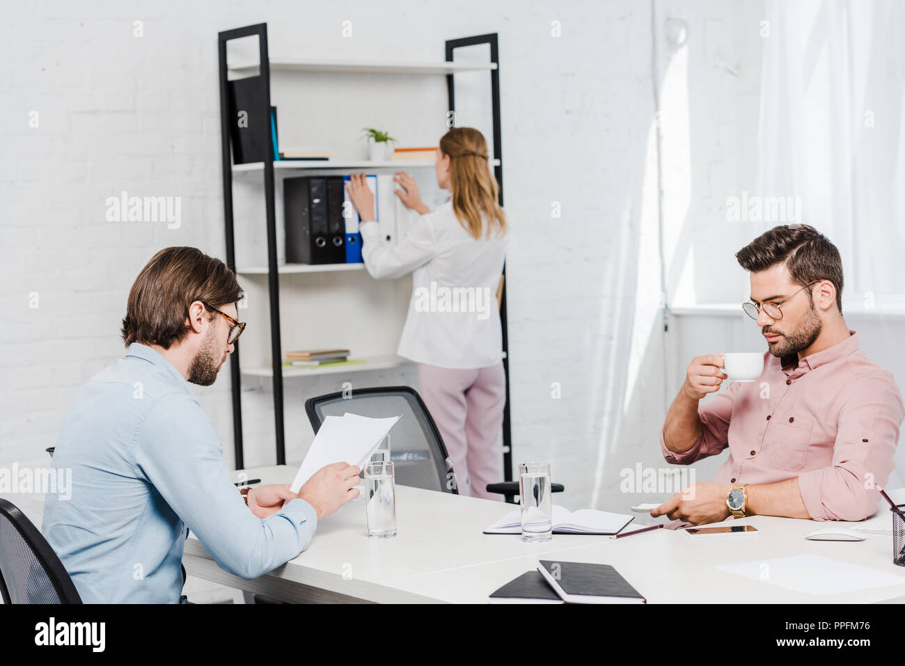 successful business partners having conversation at conference room of ...