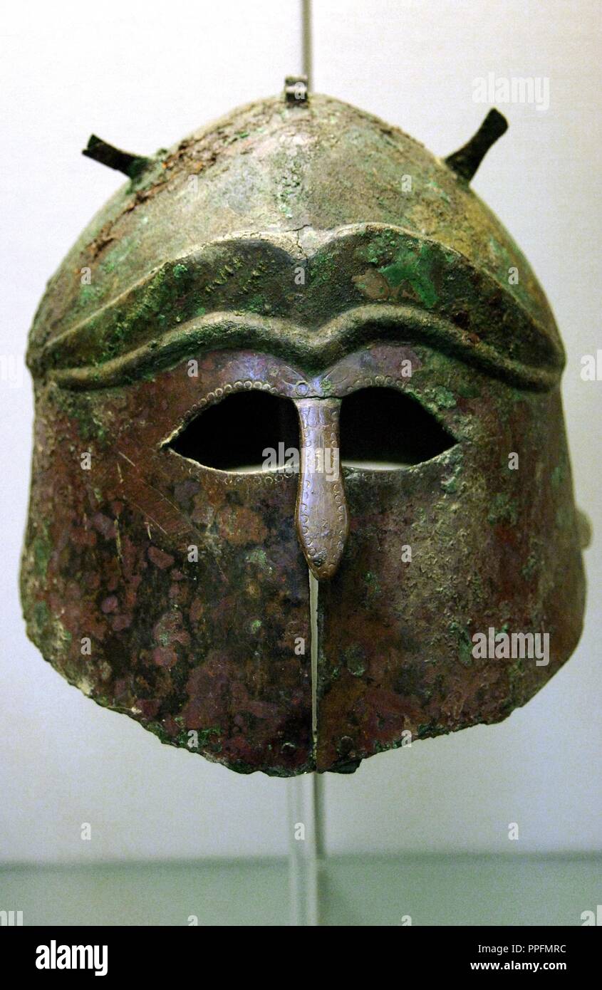Apulo-Corinthian helmet. Bronze. 400-350 BC. From Ruvo, Apulia. British ...
