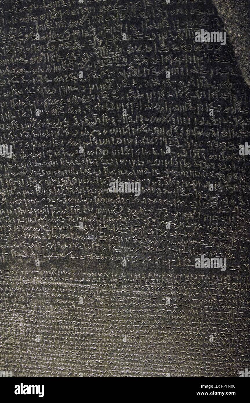 The Rosetta Stone. Fragment of a black granite stele with an ...