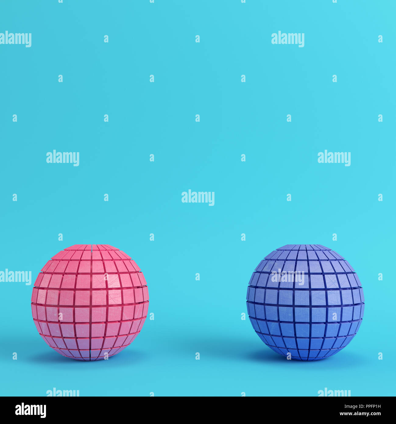 Abstract segmented spheres on bright blue background in pastel colors ...