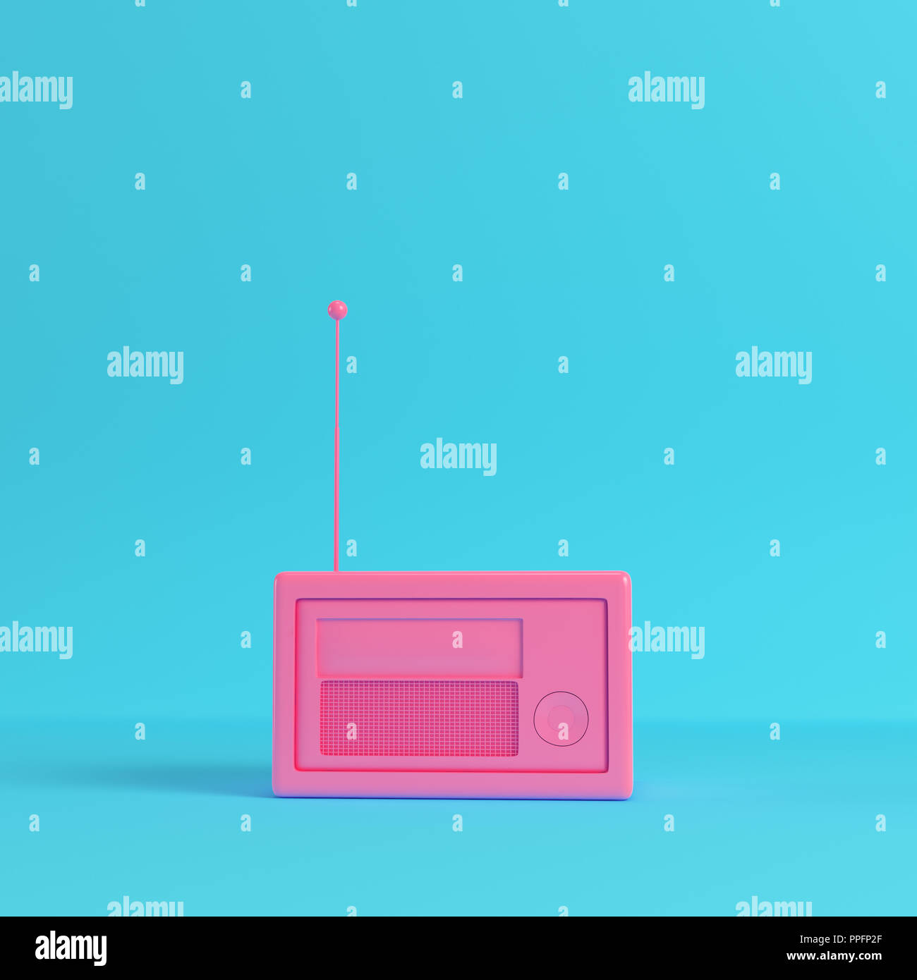 Pink retro styled radio on bright blue background in pastel colors ...