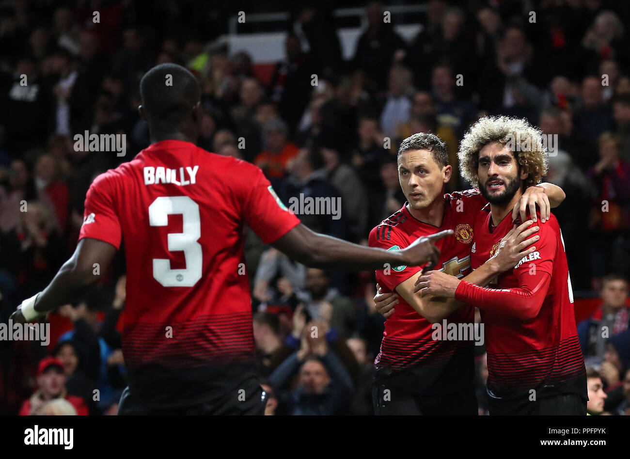 Manchester United's Marouane Fellaini (right) celebrates scoring his ...