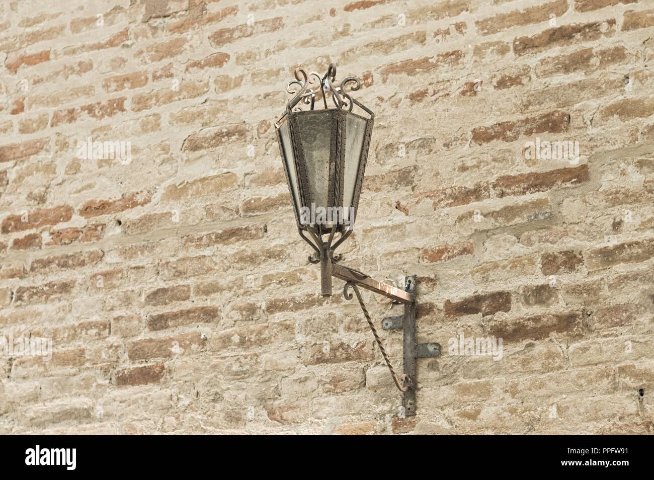 Medieval lantern on the brick wall (Marche, Italy, Europe Stock Photo ...