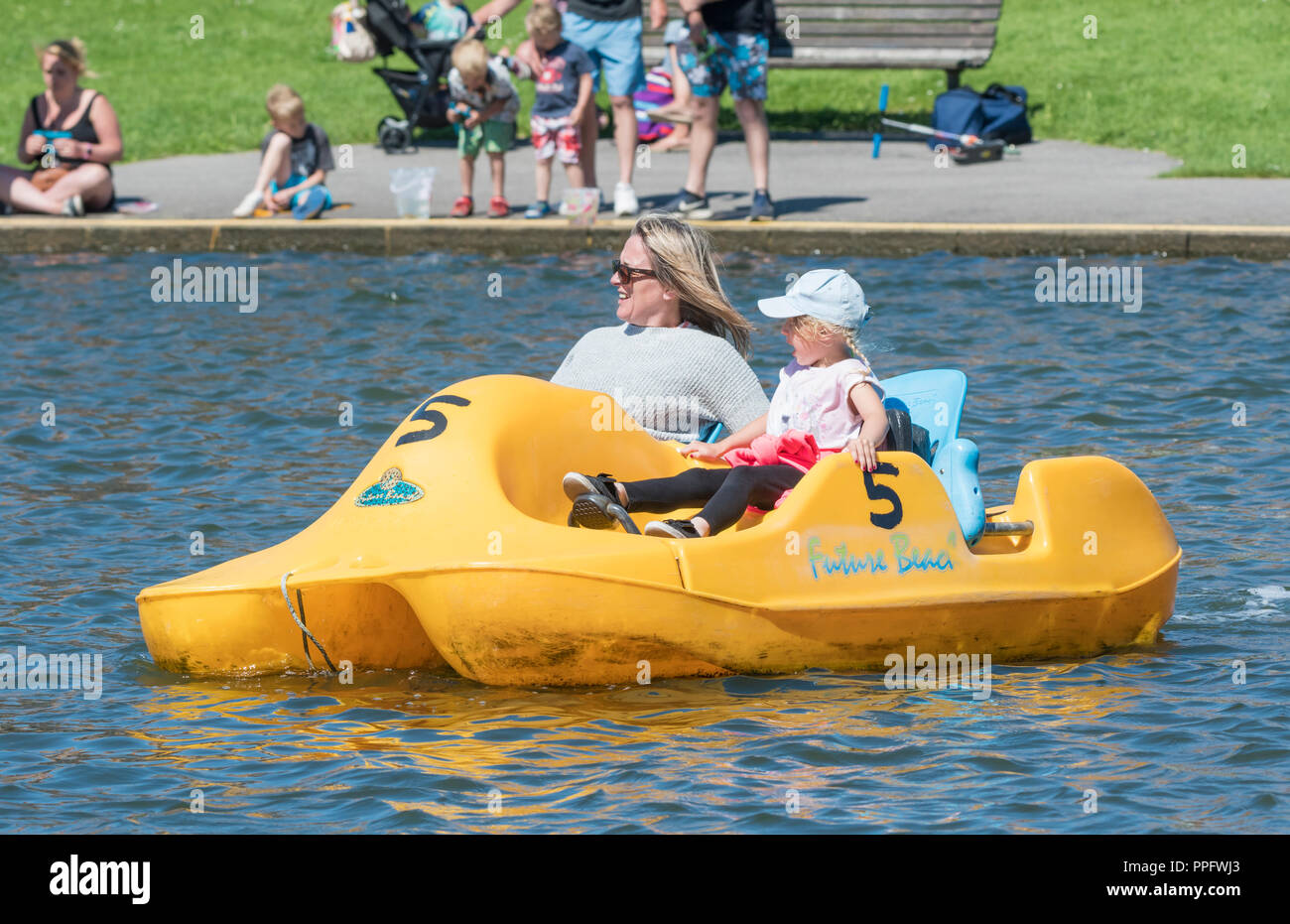 Riding on the paddle boat hi-res stock photography and images - Alamy