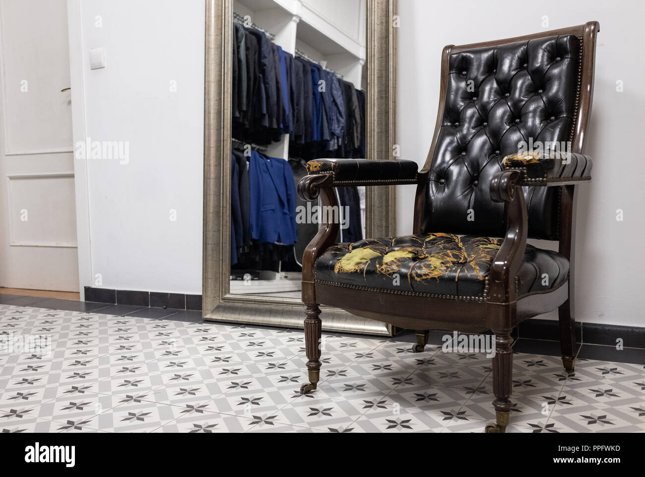 antique armchair in a clothing store fitting shop Stock Photo - Alamy