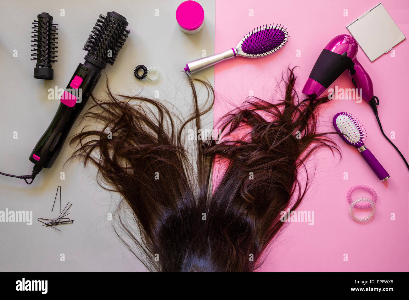 Professional hairdressing tools and brunette on pink background Stock ...