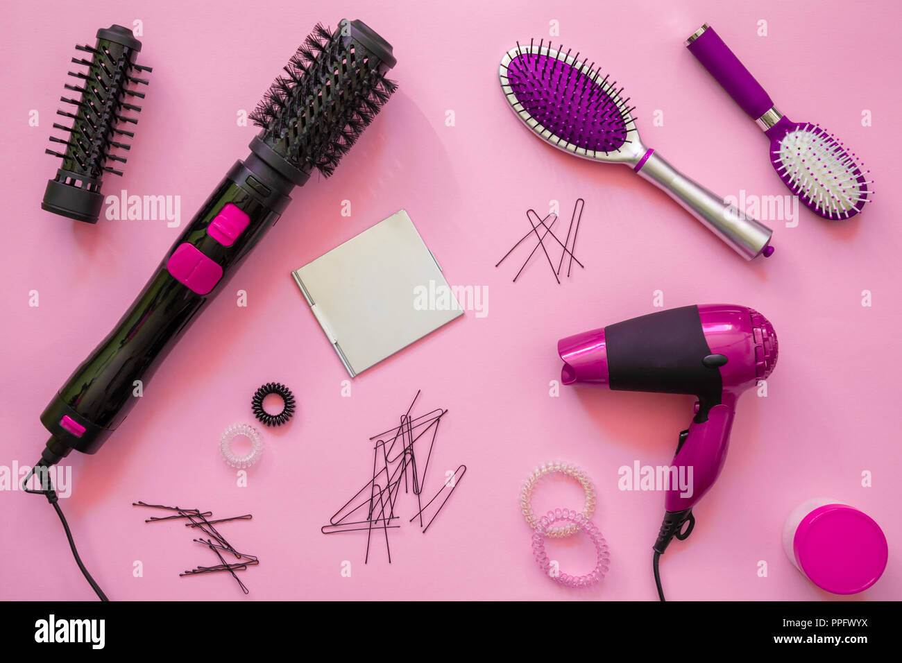 Professional hairdressing tools, pink background Stock Photo - Alamy