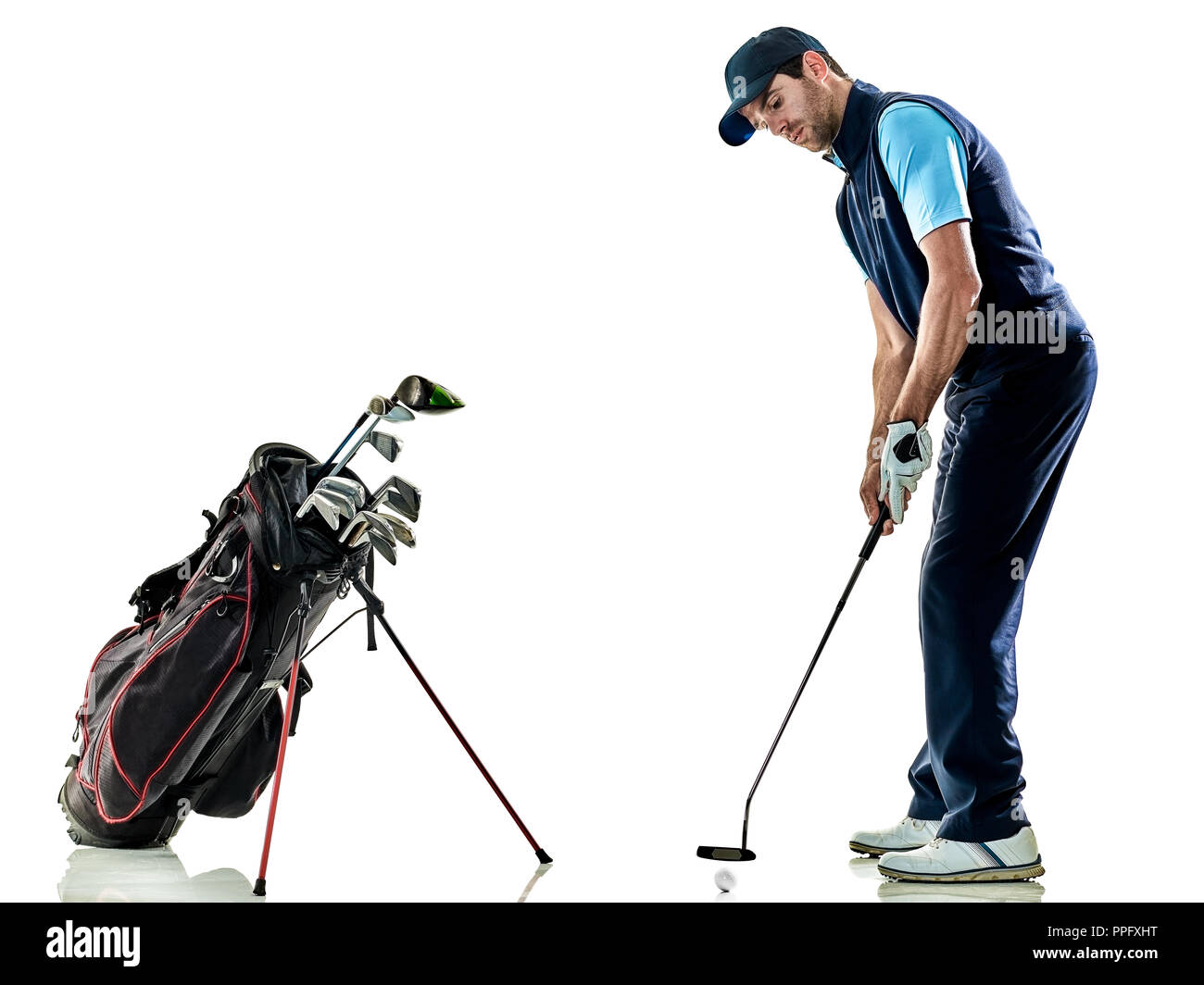 one caucasian man golfer golfing in studio isolated on white background ...