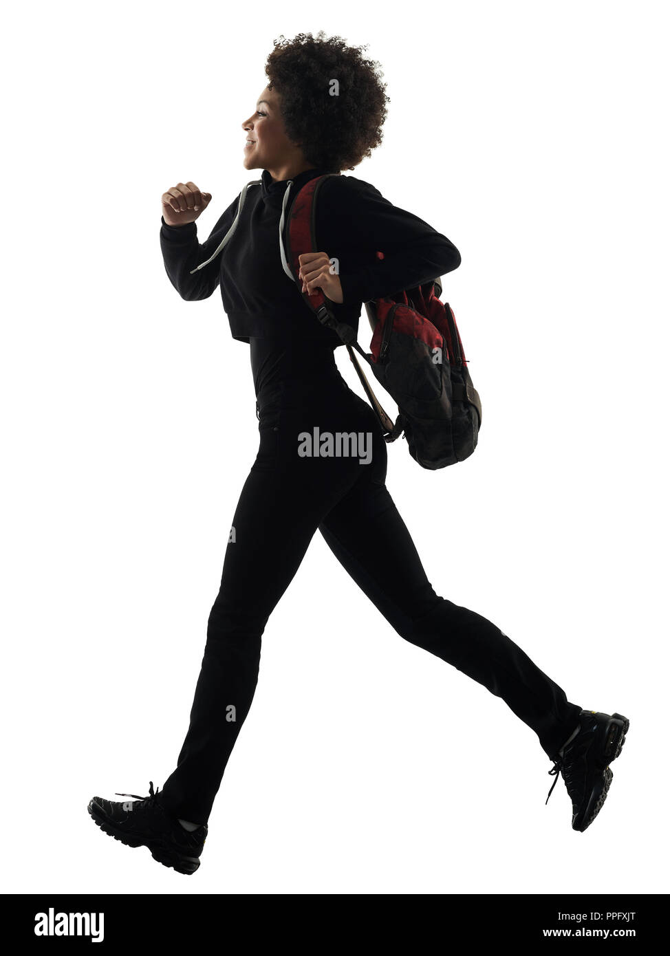 one mixed race african young teenager girl woman running smiling in ...