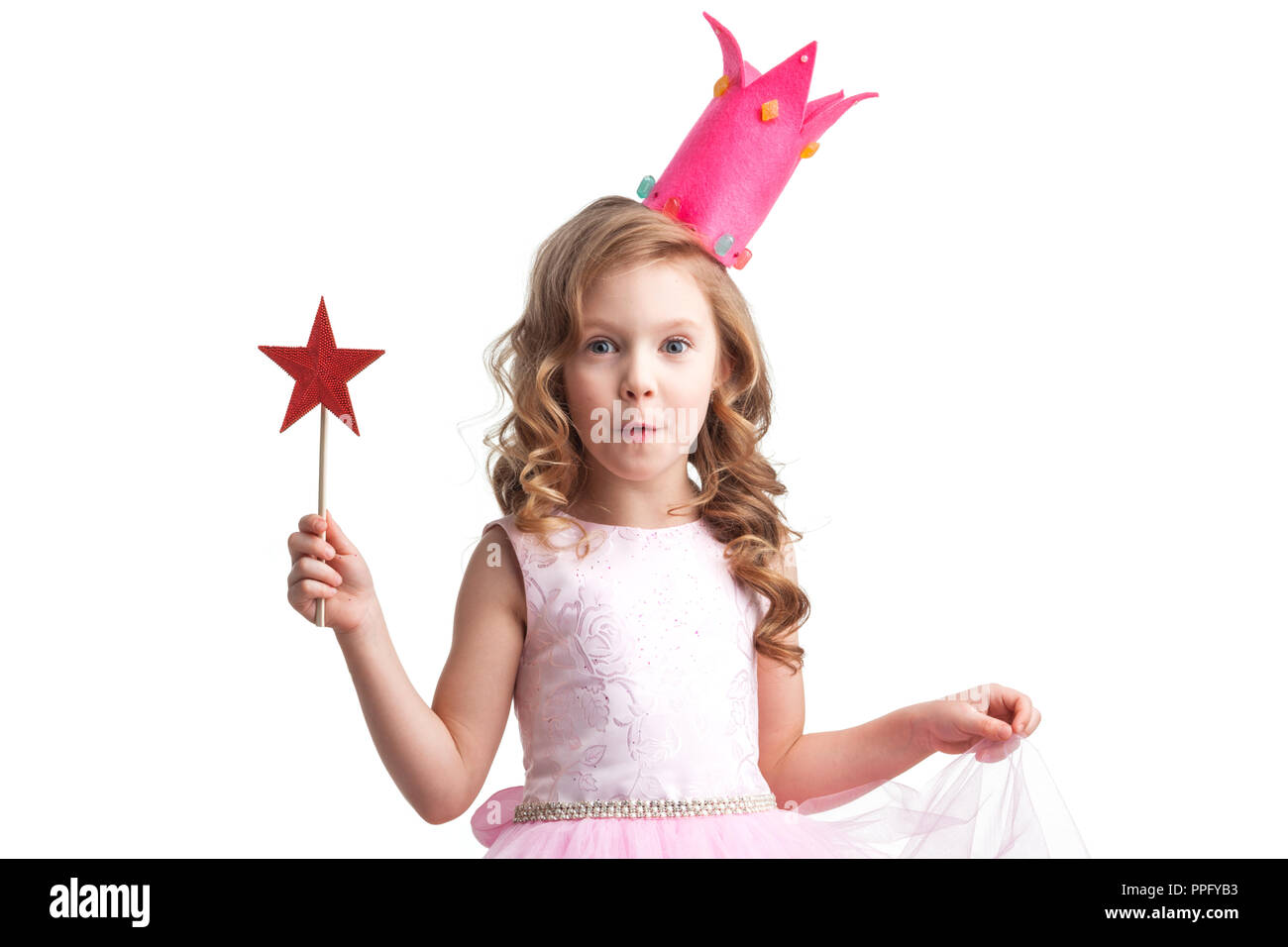 Beautiful little candy princess girl in crown holding star shaped magic ...