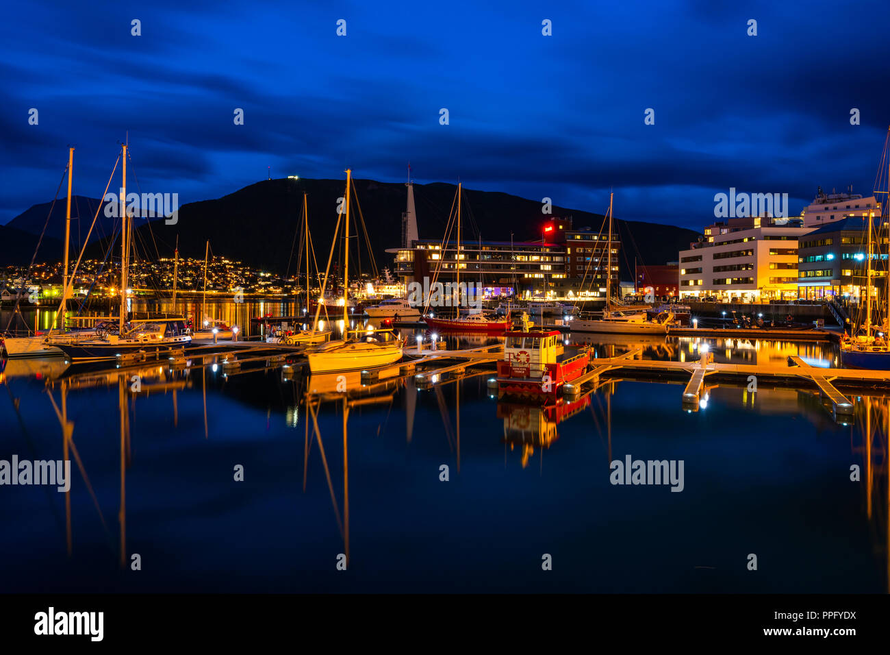 TROMSO, NORWAY - AUGUST 29, 2018: Night view of marina area in Tromso ...