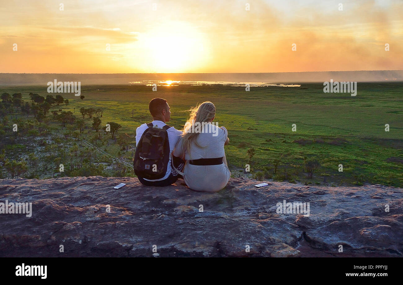 Two visitors sit on rocks hi-res stock photography and images - Alamy