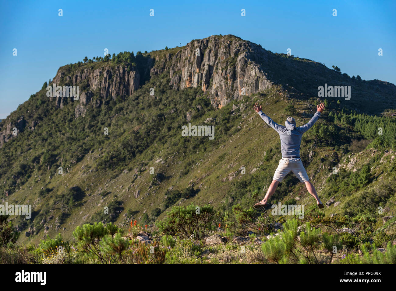 A tourist admires the view of World's view in Nyanga, Zimbabwe Stock ...