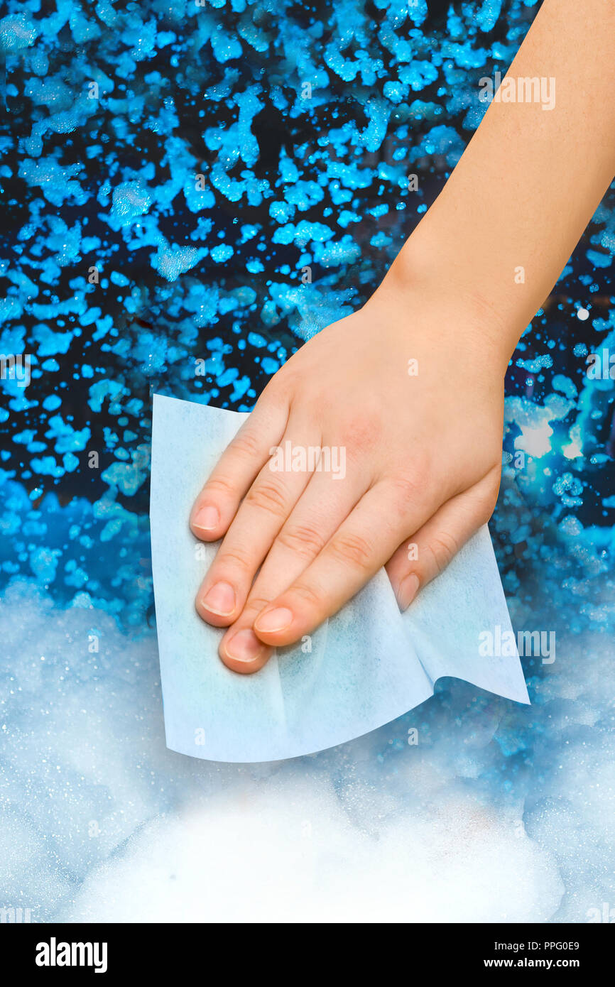 hand with wet wipe makes wet cleaning with foam Stock Photo - Alamy