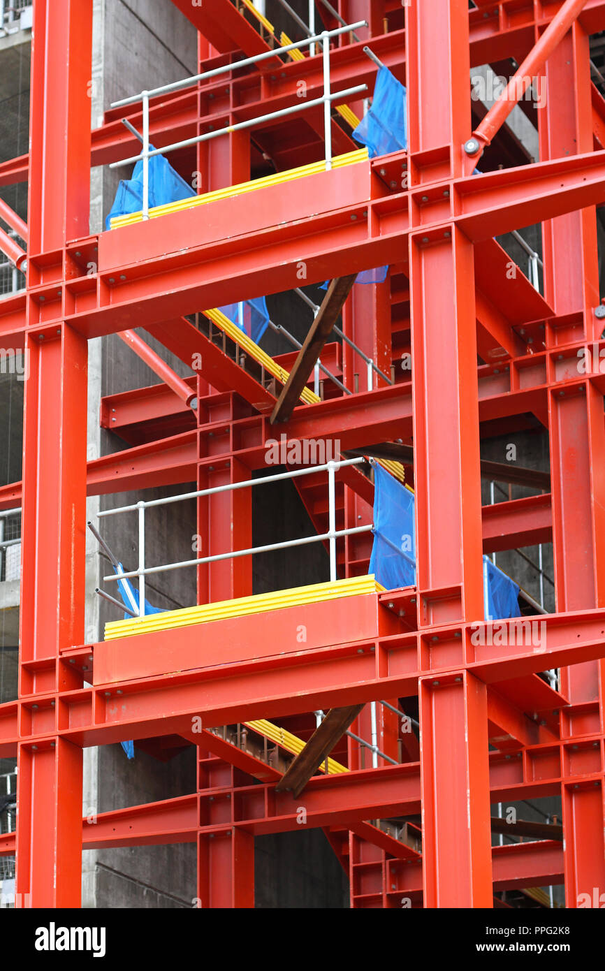 Red metal scaffold equipment at construction site Stock Photo - Alamy