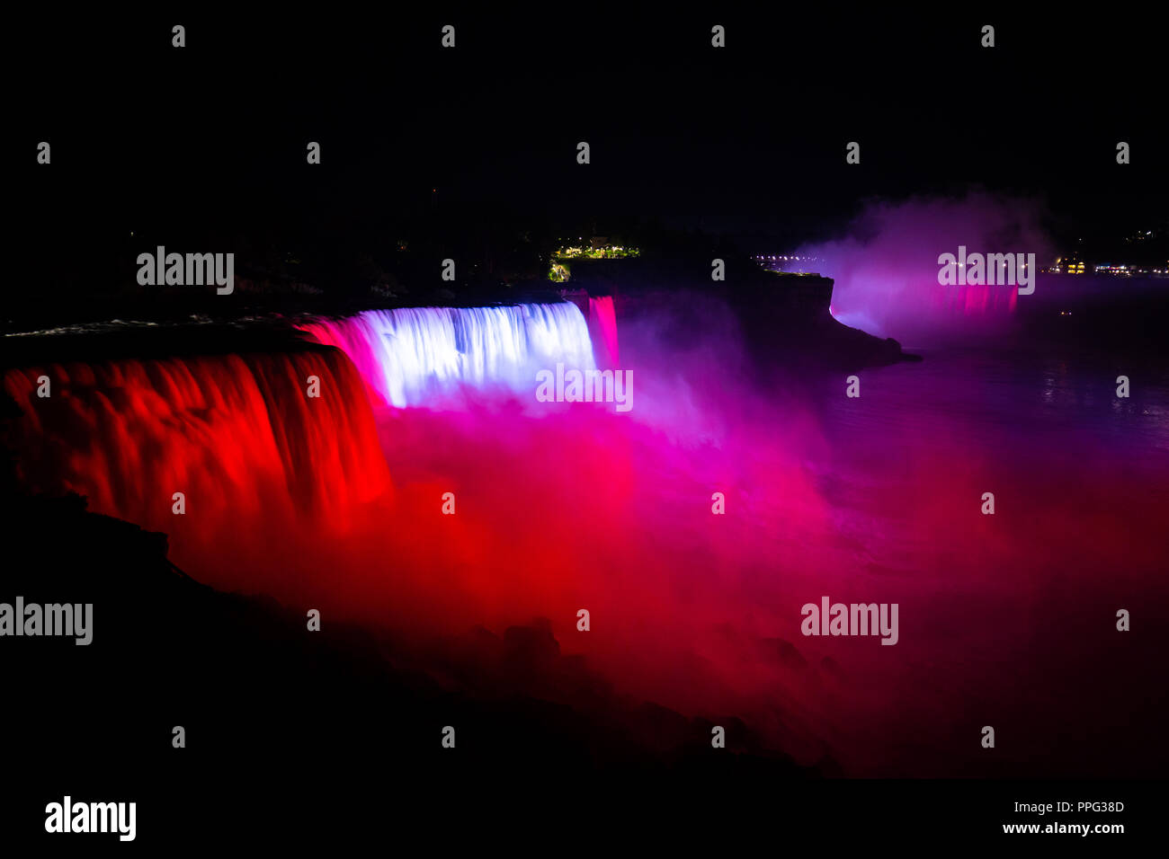 NIagara falls illuminated with color lights at night view Stock Photo ...
