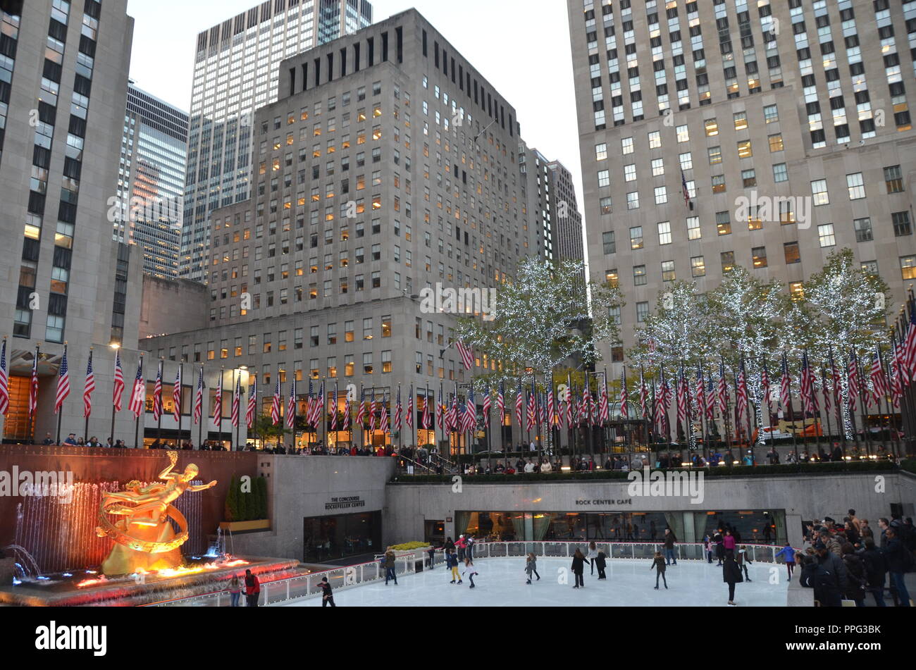 Rockefeller Center Ice skaters and tourists are all around the famous ...