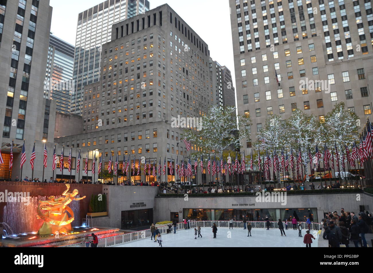 Rockefeller Center Ice skaters and tourists are all around the famous ...