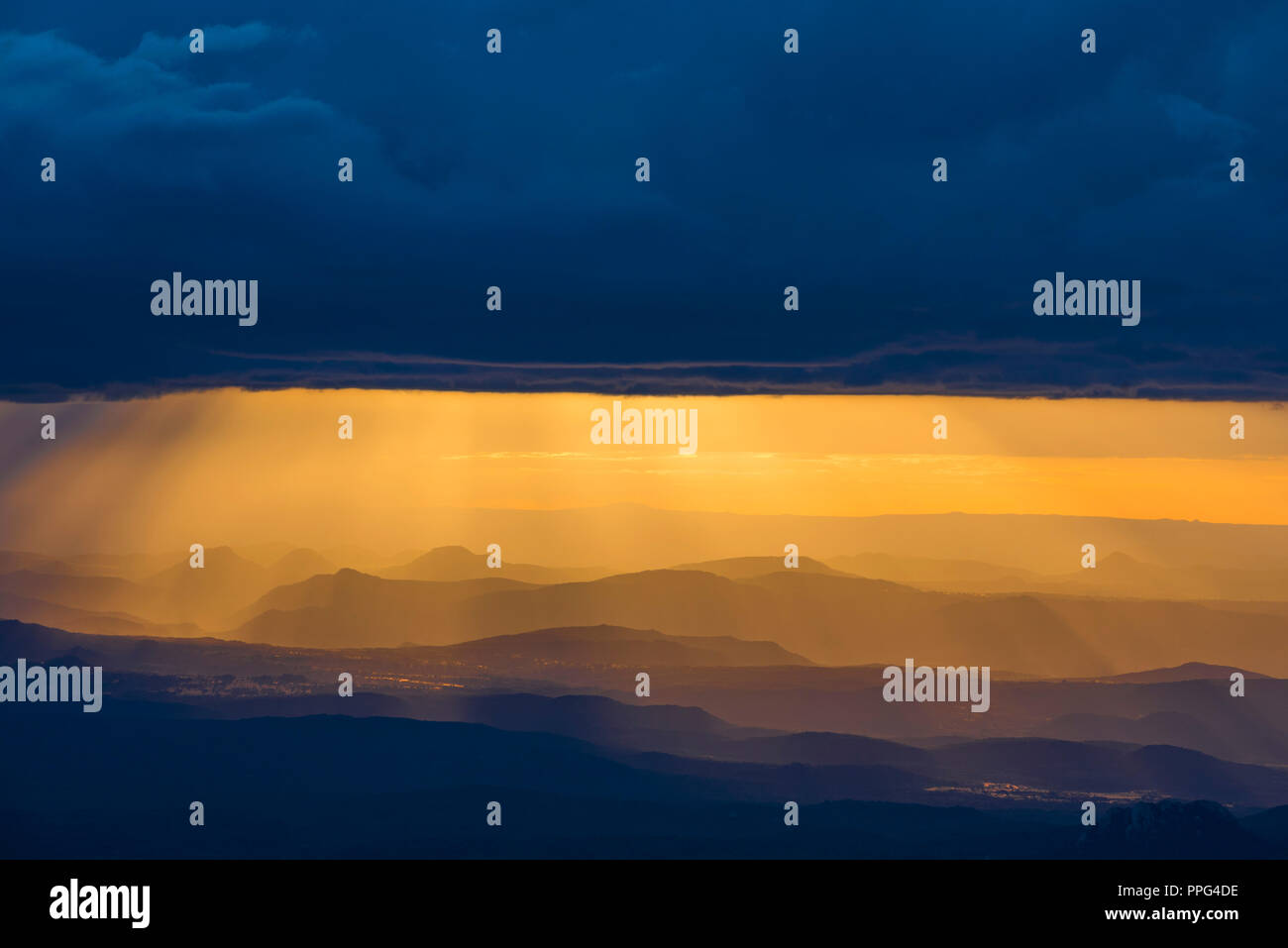 A dramatic golden sunset seen from World's View in Zimbabwe's Eastern ...