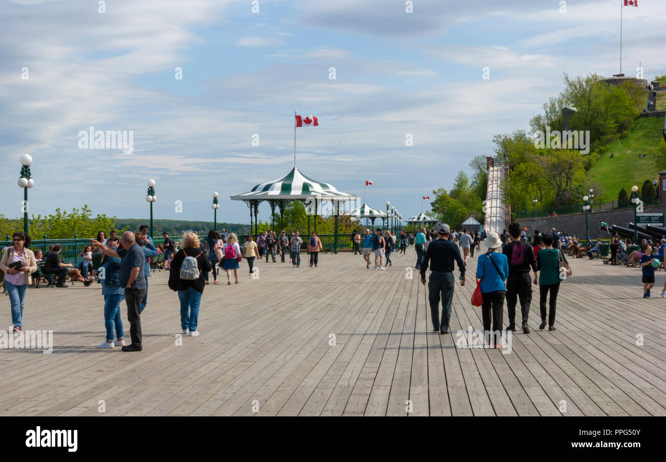 Tourists enjoying a stroll on the wooden boardwalk of the Dufferin ...