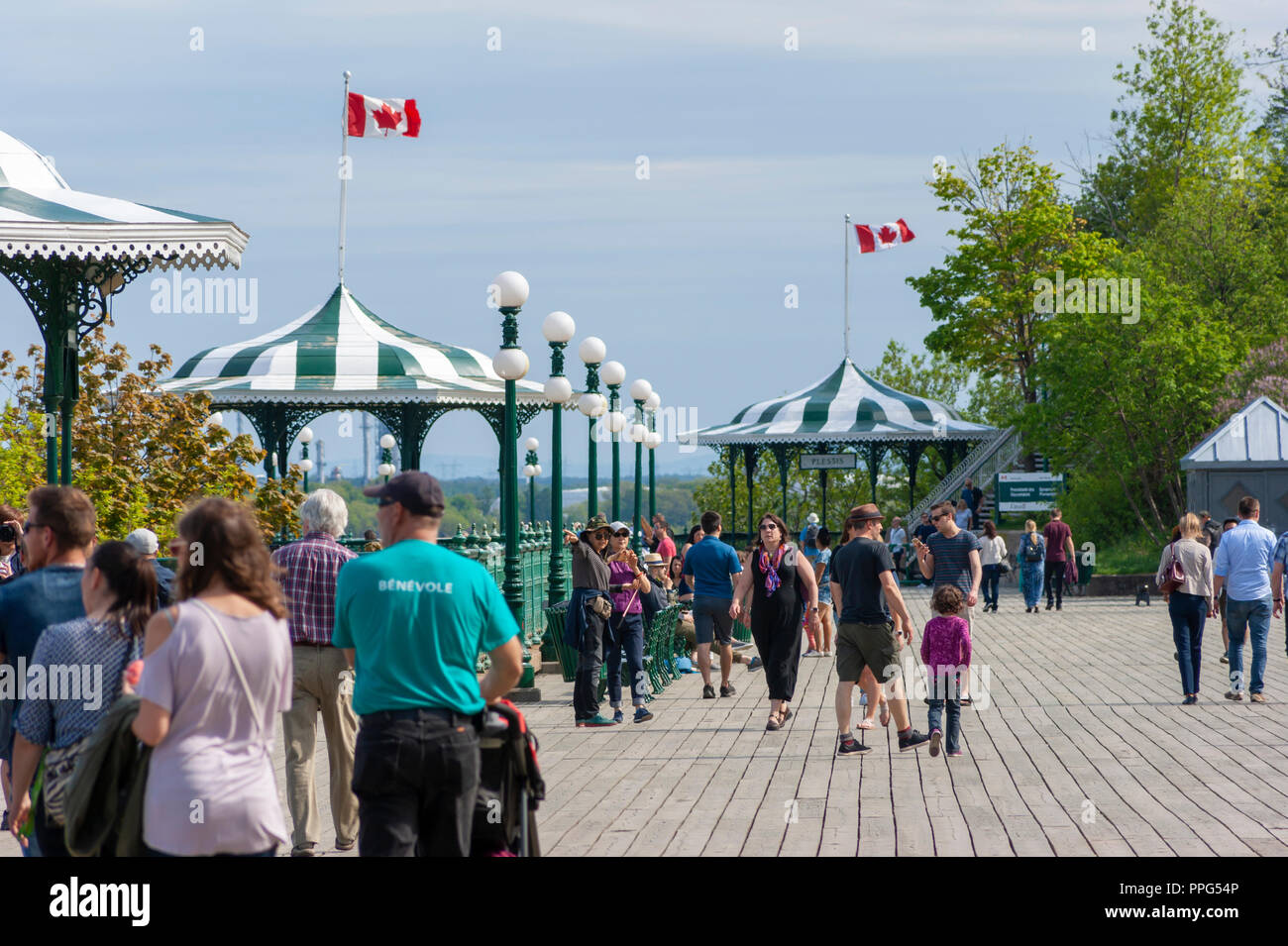 Tourists enjoying a stroll on the wooden boardwalk of the Dufferin ...