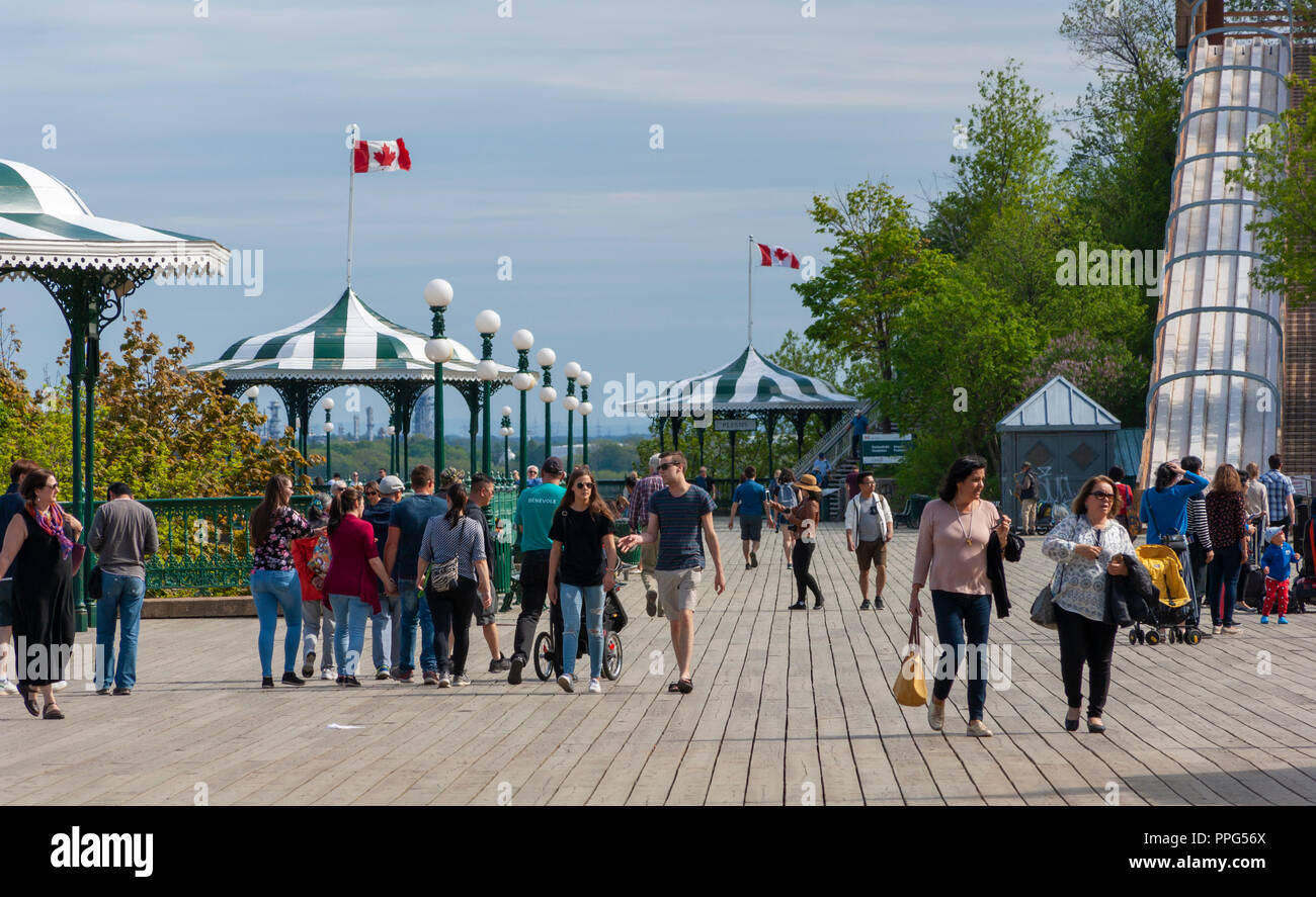 Tourists enjoying a stroll on the wooden boardwalk of the Dufferin ...