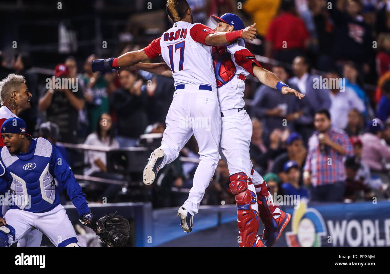 T.J. Rivera (5) corre para anotar la carrera 11 de Puerto Rico, durante ...