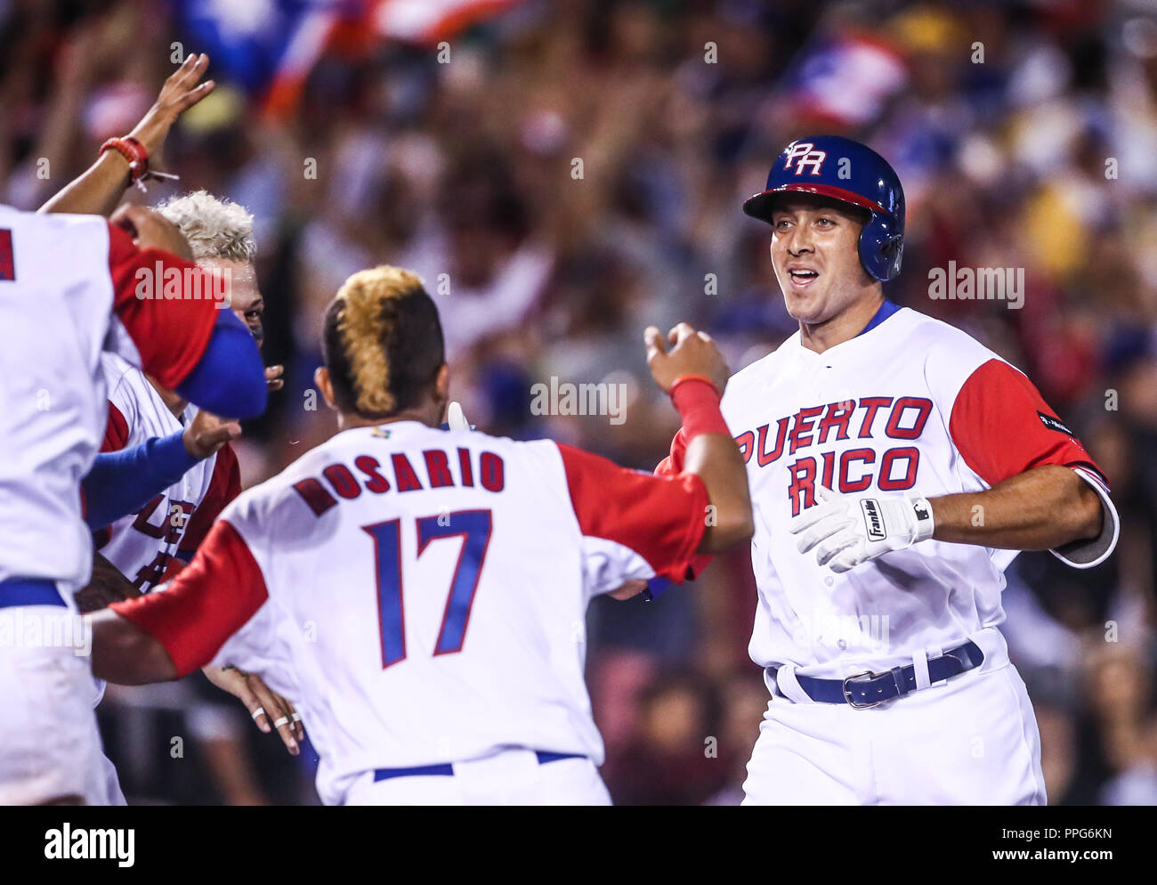 T.J. Rivera (5) corre para anotar la carrera 11 de Puerto Rico, durante ...