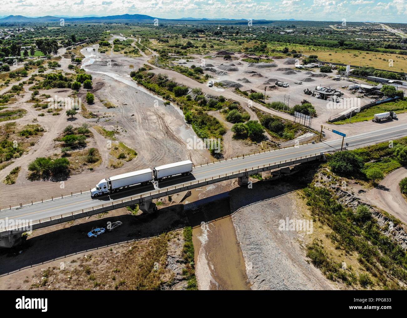 Aerial view of bridge in peripheral area of Santa Ana, Sonora, Mexico ...