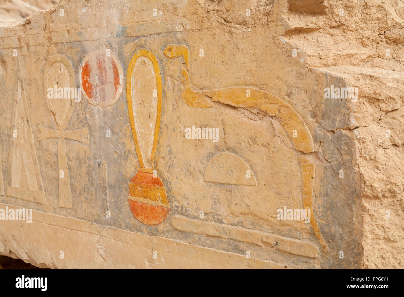 Stone with drawings depicting a snake and the ankh. Mortuary Temple of ...