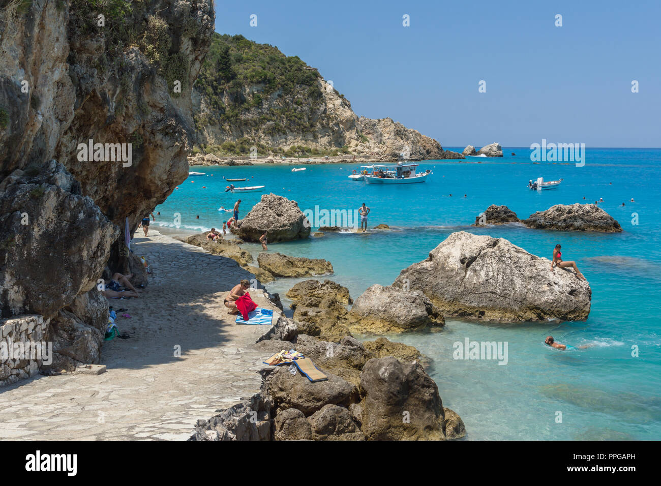AGIOS NIKITAS, LEFKADA, GREECE - JULY 16, 2014: Tourists visiting beach ...