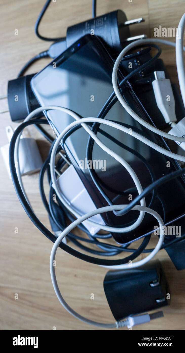 Tangled earphones hi-res stock photography and images - Alamy