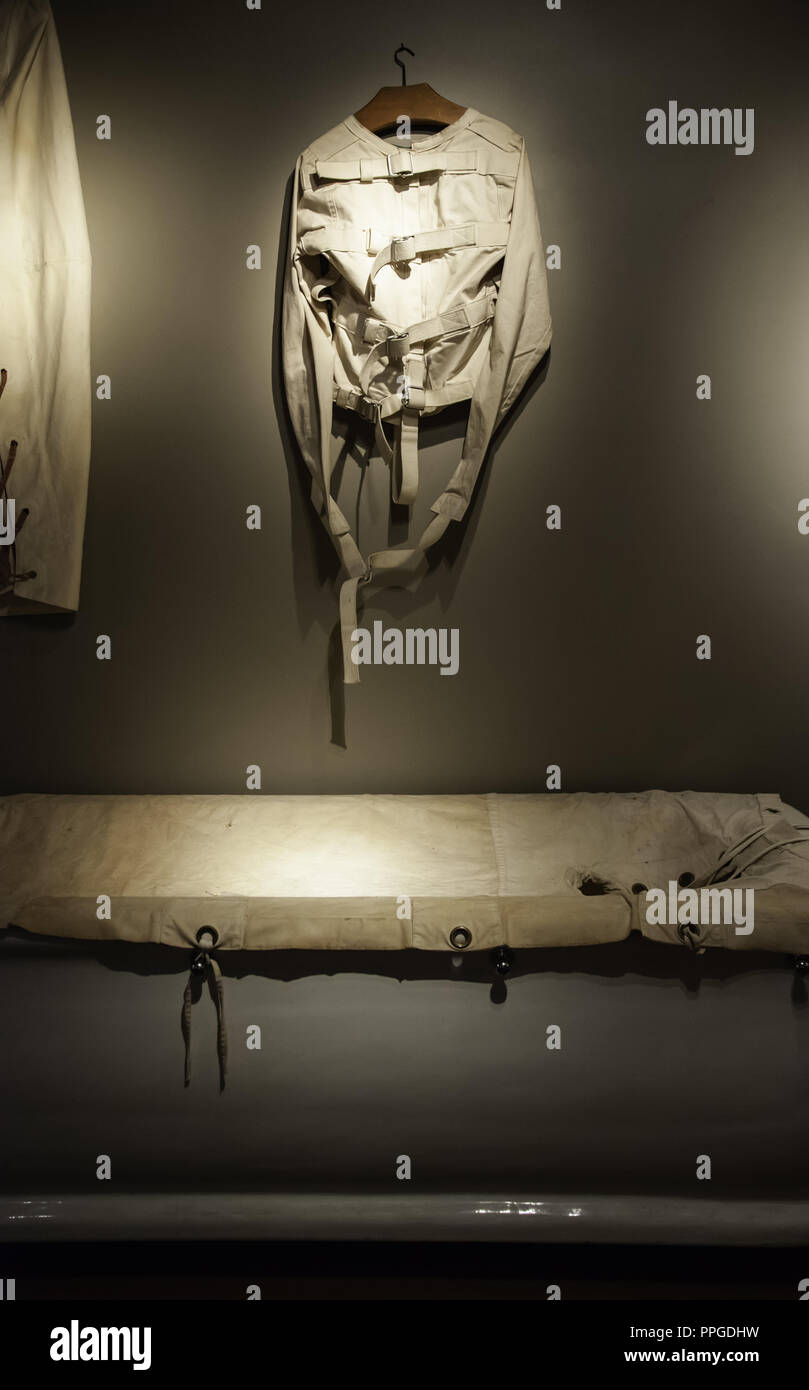 Straitjacket woman hi-res stock photography and images - Alamy