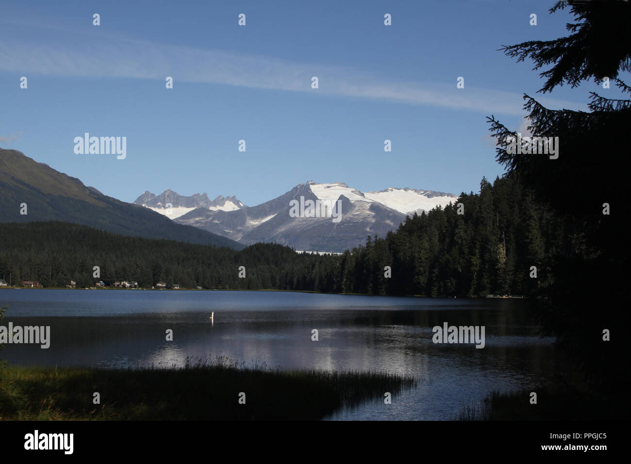 Auke Lake with the Mendenhall glacier and mountains in the background ...