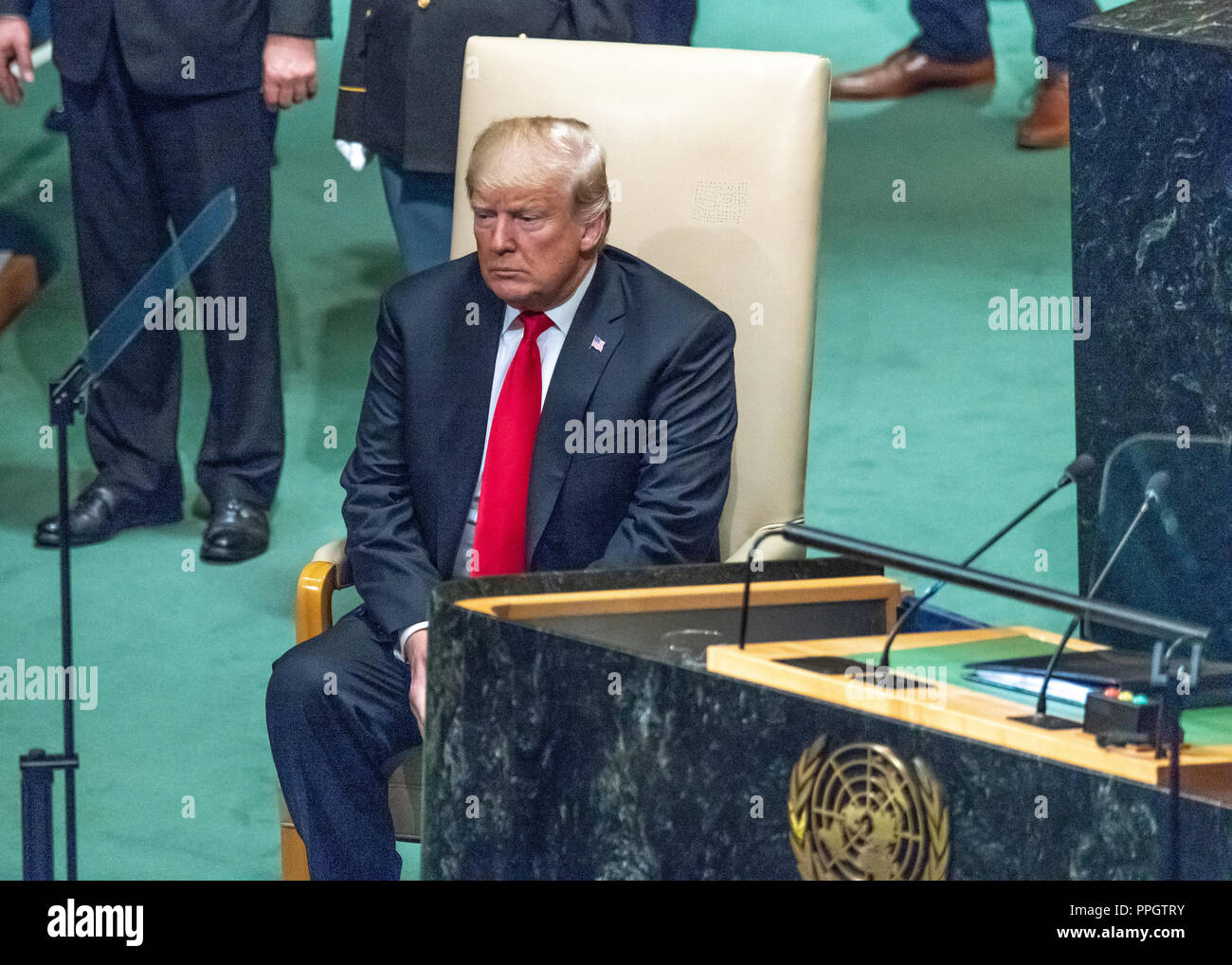 New York, USA, 25 September 2018. US President Donald Trump sits on a ...