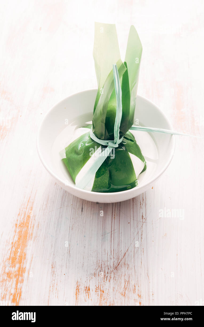 Burrata cheese made with "mozzarella di bufala" on a cozy package ...