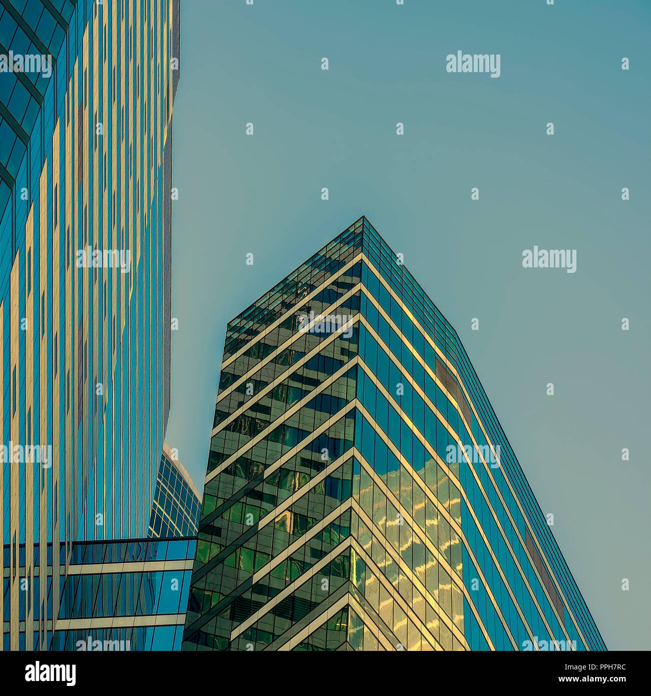 Modern abstract buildings, geometric pattern of glass and concrete ...